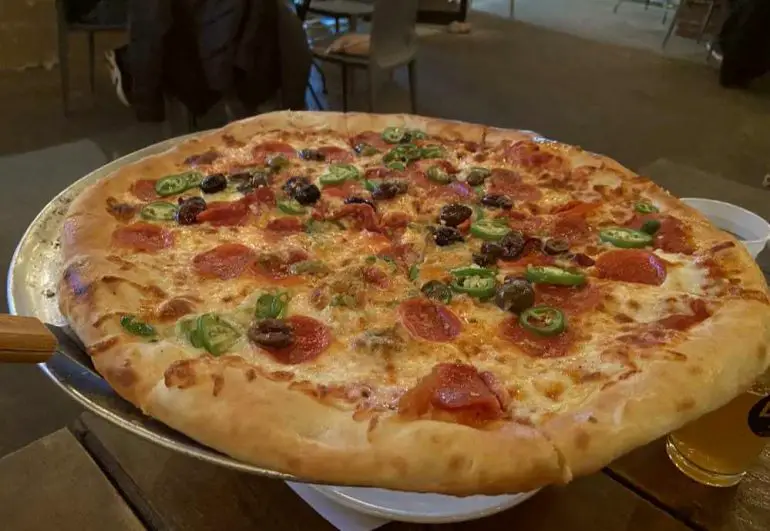 The Best Pizza Spots in Kansas City - (With Cheesy Photos)
